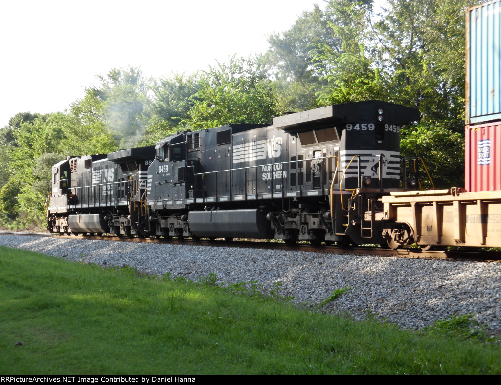 NS 8818 & 9459 move slowly west with NS 23N